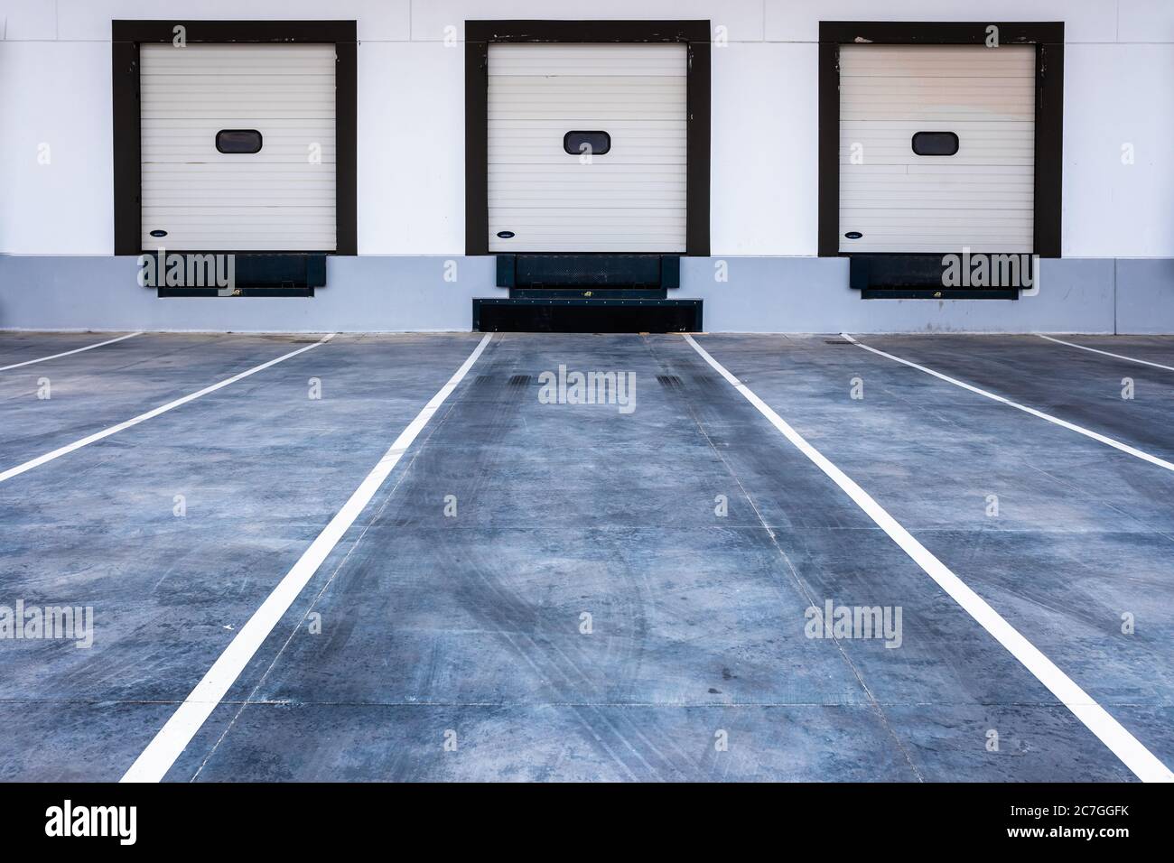 Loading bays for trucks in a modern merchandise shipping company Stock ...