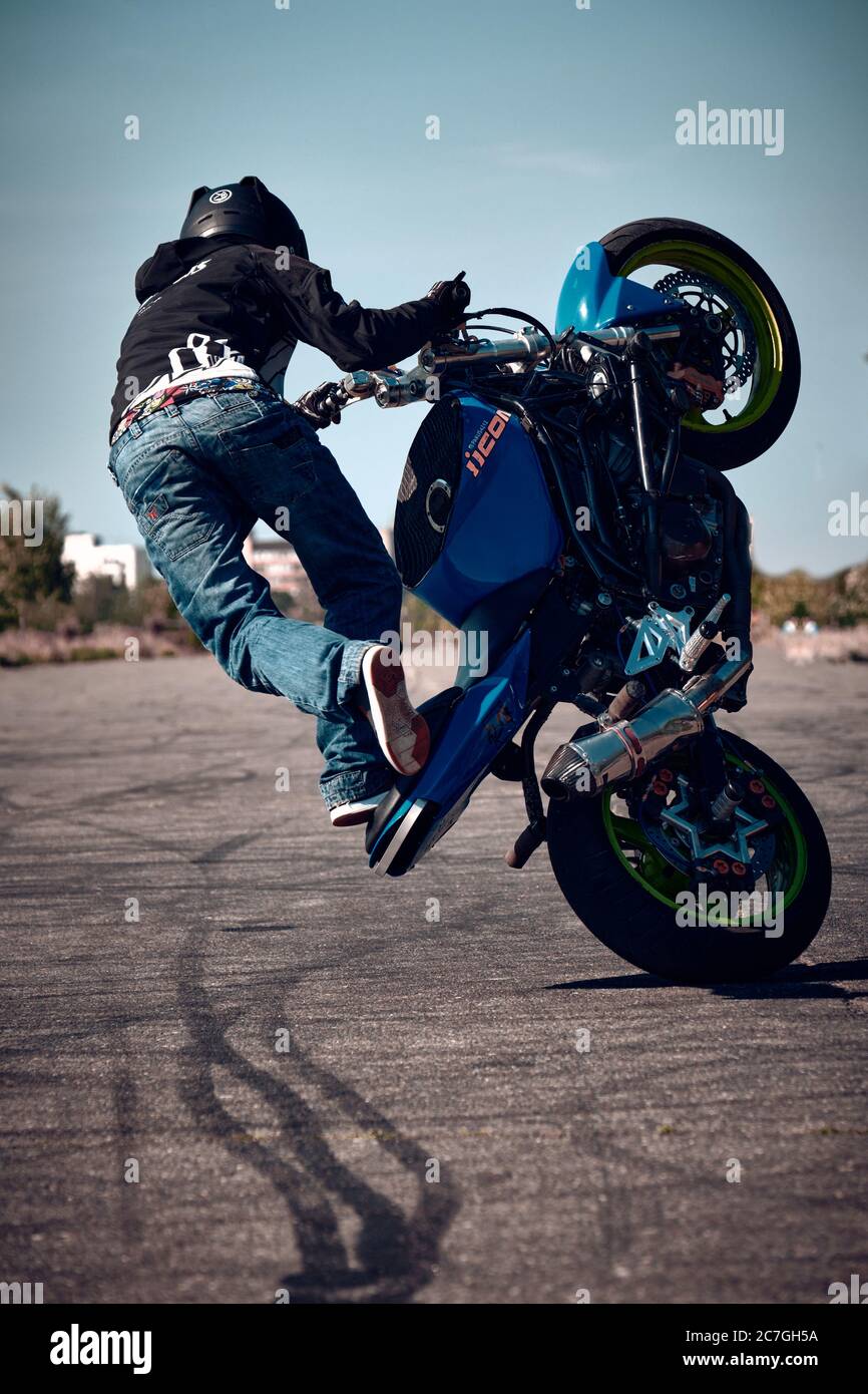 Moscow, Russia - 12 Jul 2020: Moto rider making a stunt on his ...