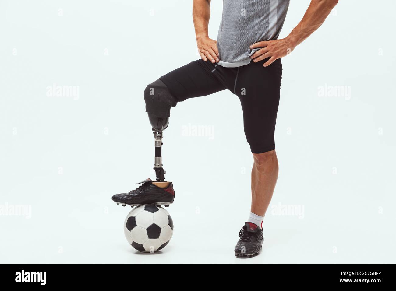 Athlete with disabilities or amputee on white studio background ...