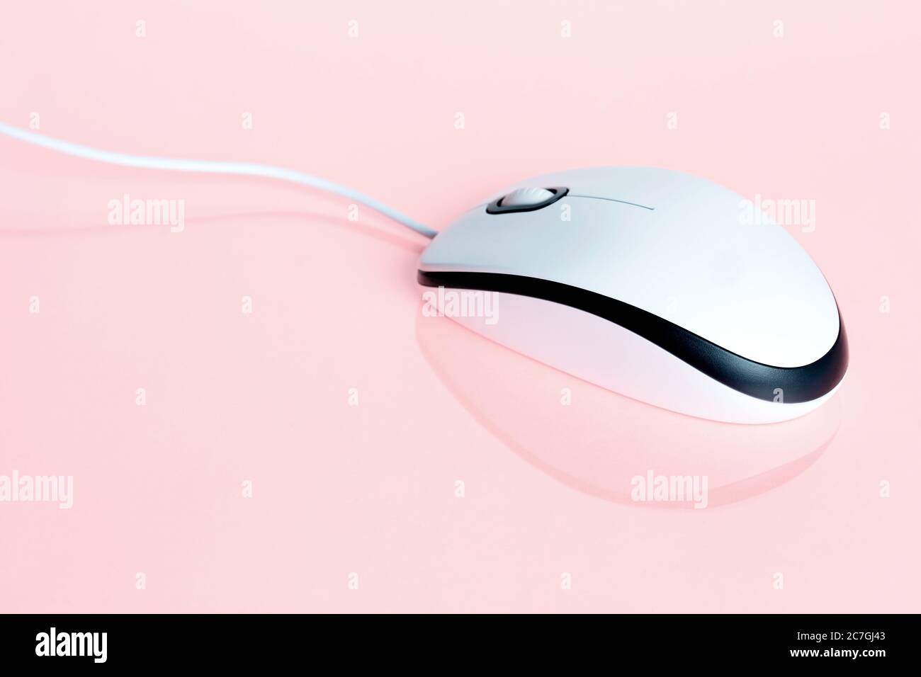 White minimalist computer mouse on pastel pink background Stock Photo ...