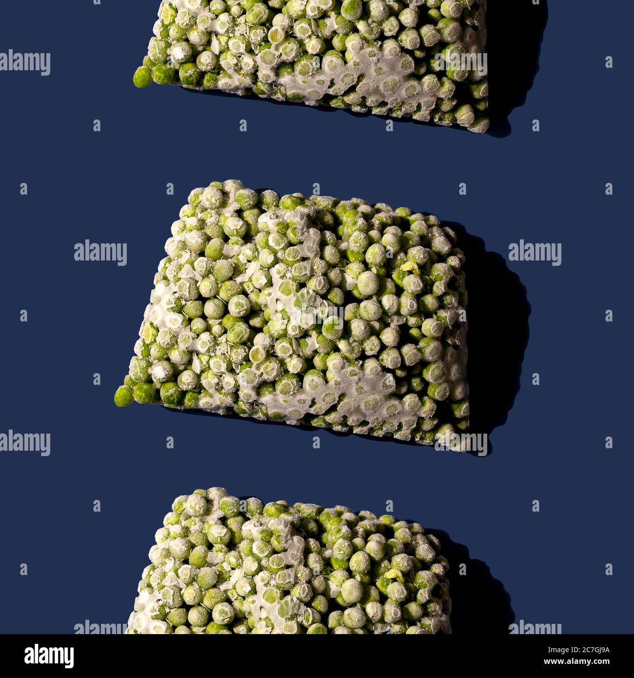 Pattern of frozen green pea on blue background.Modern abstract food ...