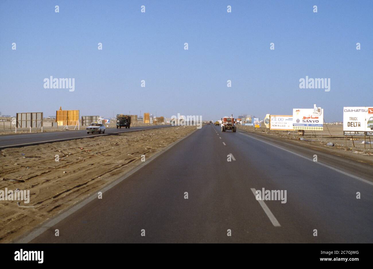 Rubbish in Scrub Desert and Advertising Hoarding alongside Sharjah to ...
