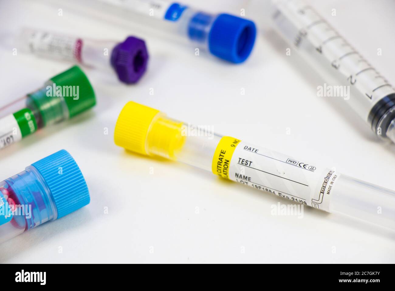Blood test tubes on the white background, studio shoot. Blood test ...