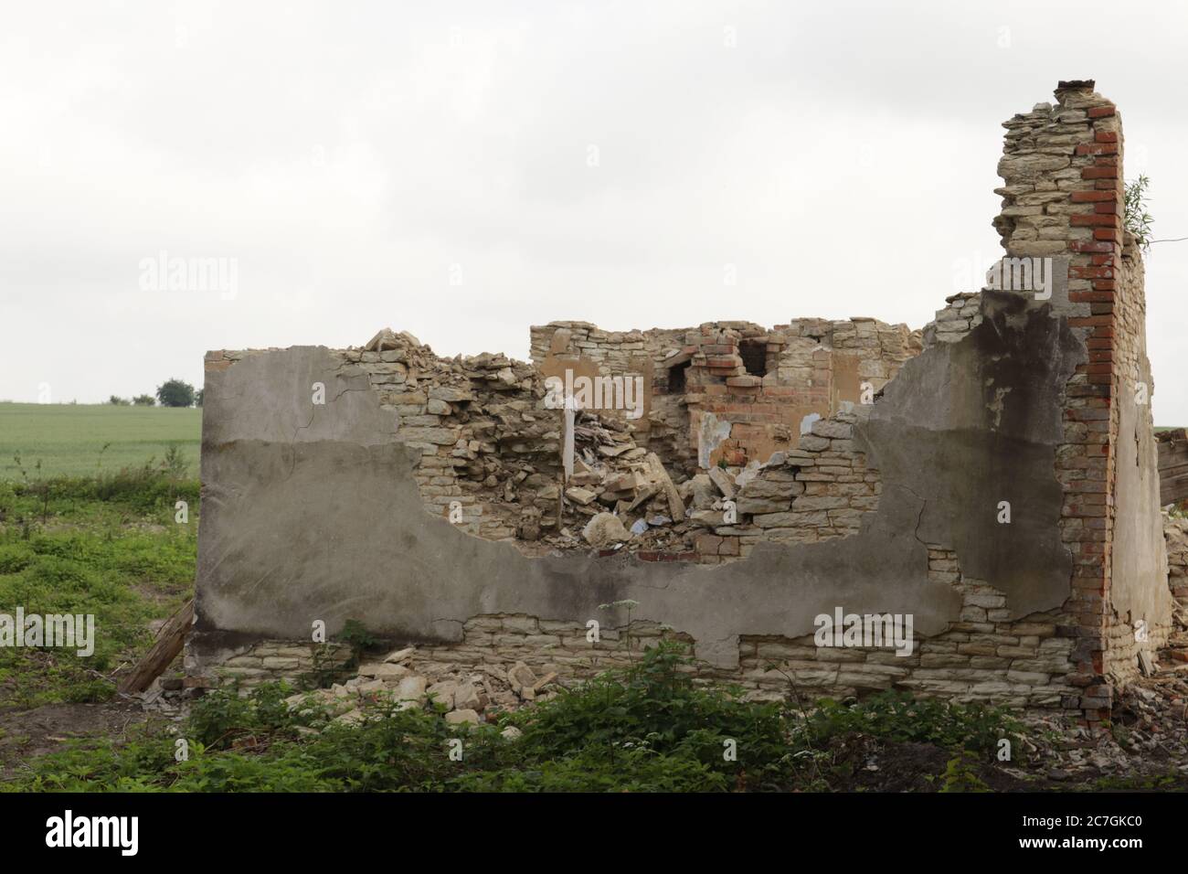 Ruins of a country house among fields Stock Photo - Alamy
