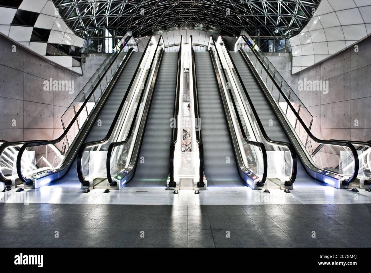 Interior shot of a building with escalators Stock Photo - Alamy