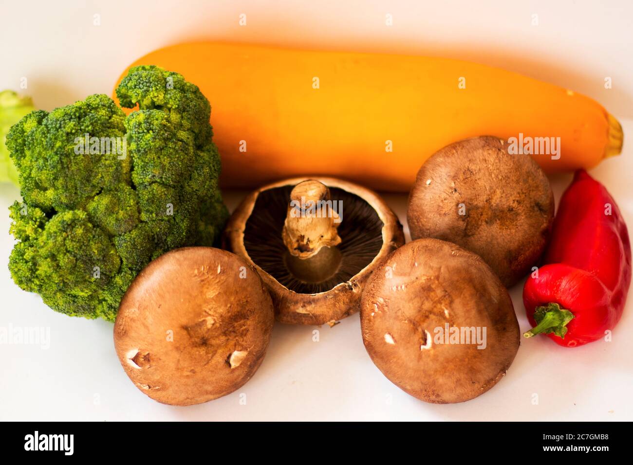 Vegetables on the table, mushroom fungus and broccoli on the white ...