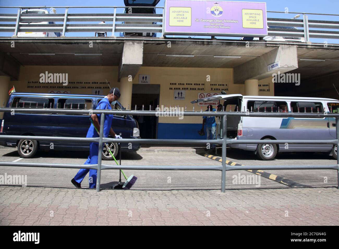 St George's Grenada Road Sweeper wearing a Face Mask Working Outside ...
