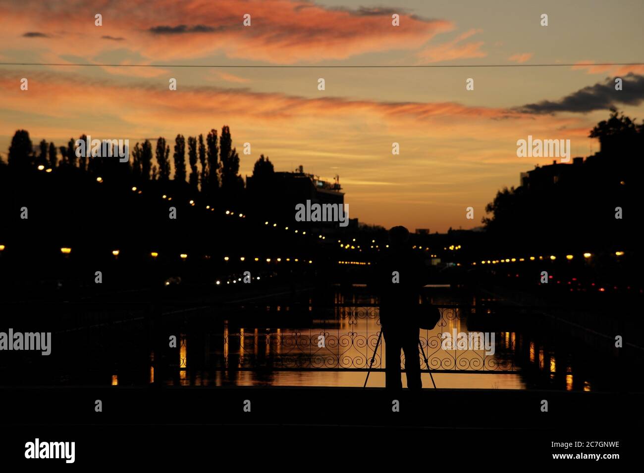 human silhouette in sunset sky Stock Photo - Alamy