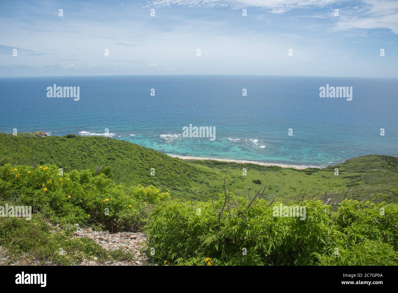 View of the lush greenery and Caribbean Sea from the Goat Hill hike on ...