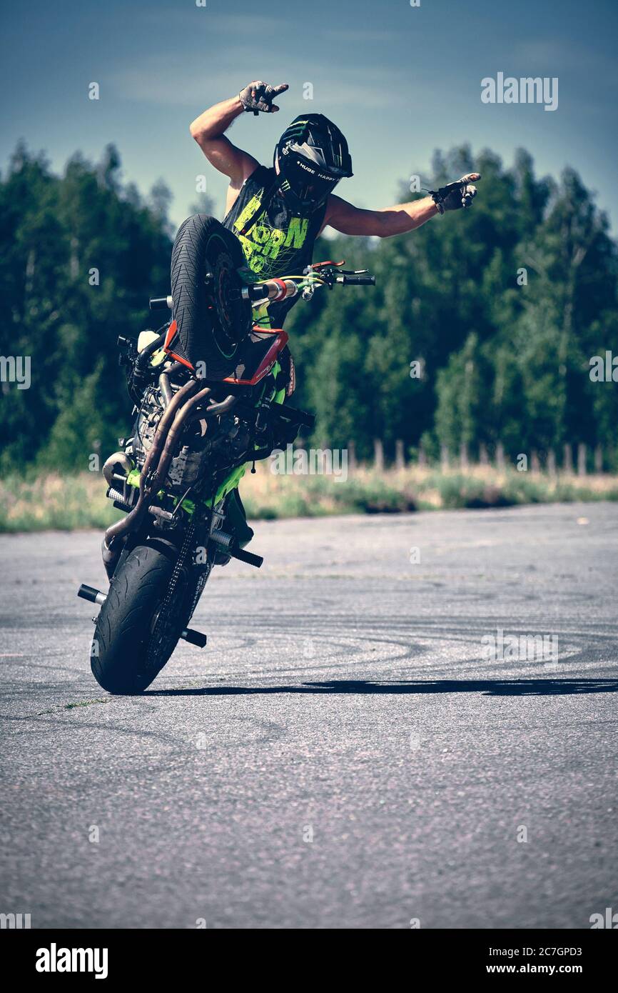 Moscow, Russia - 17 Jul 2020: Moto rider making a stunt on his ...
