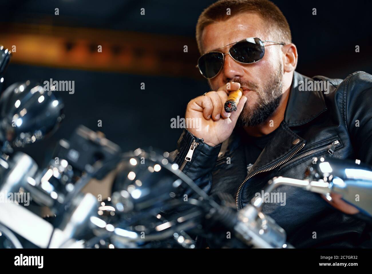 Biker smoking cigar hi-res stock photography and images - Alamy