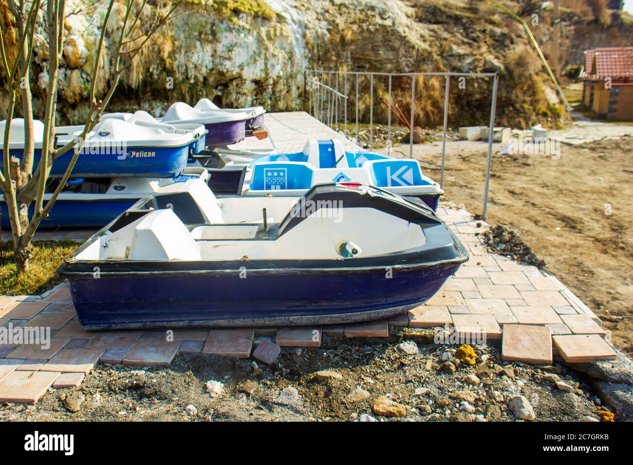 a colorful motorboats parked on the sea shore Stock Photo - Alamy