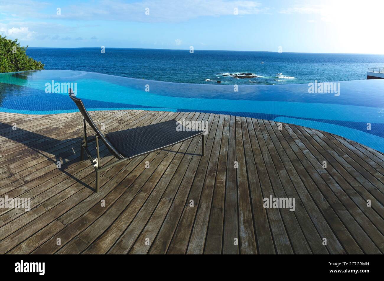 Infinity pool with views of the sea and blue sky Stock Photo - Alamy