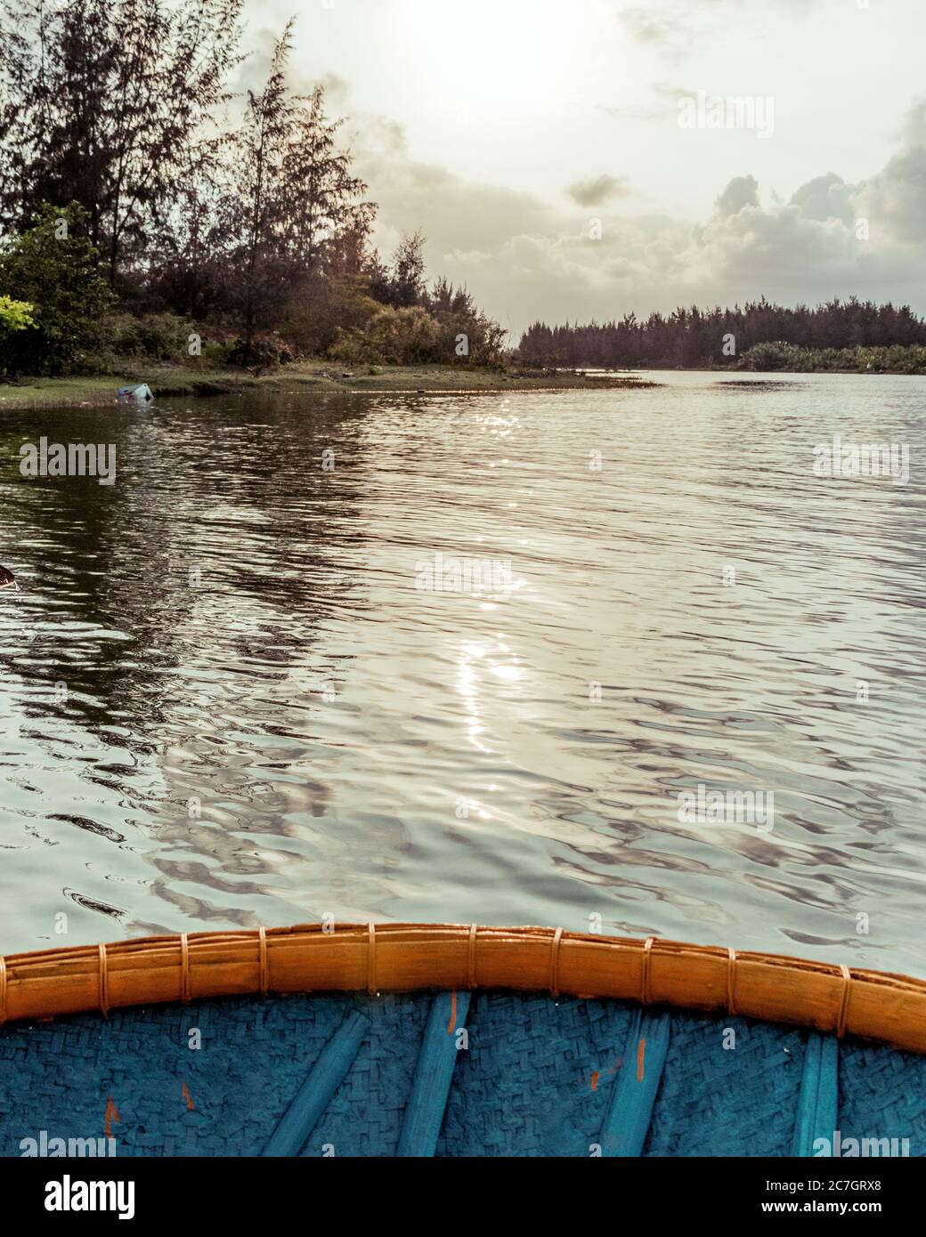 View of river from bucket boat, on Thu Bon River, Hoi An, Vietnam Stock ...