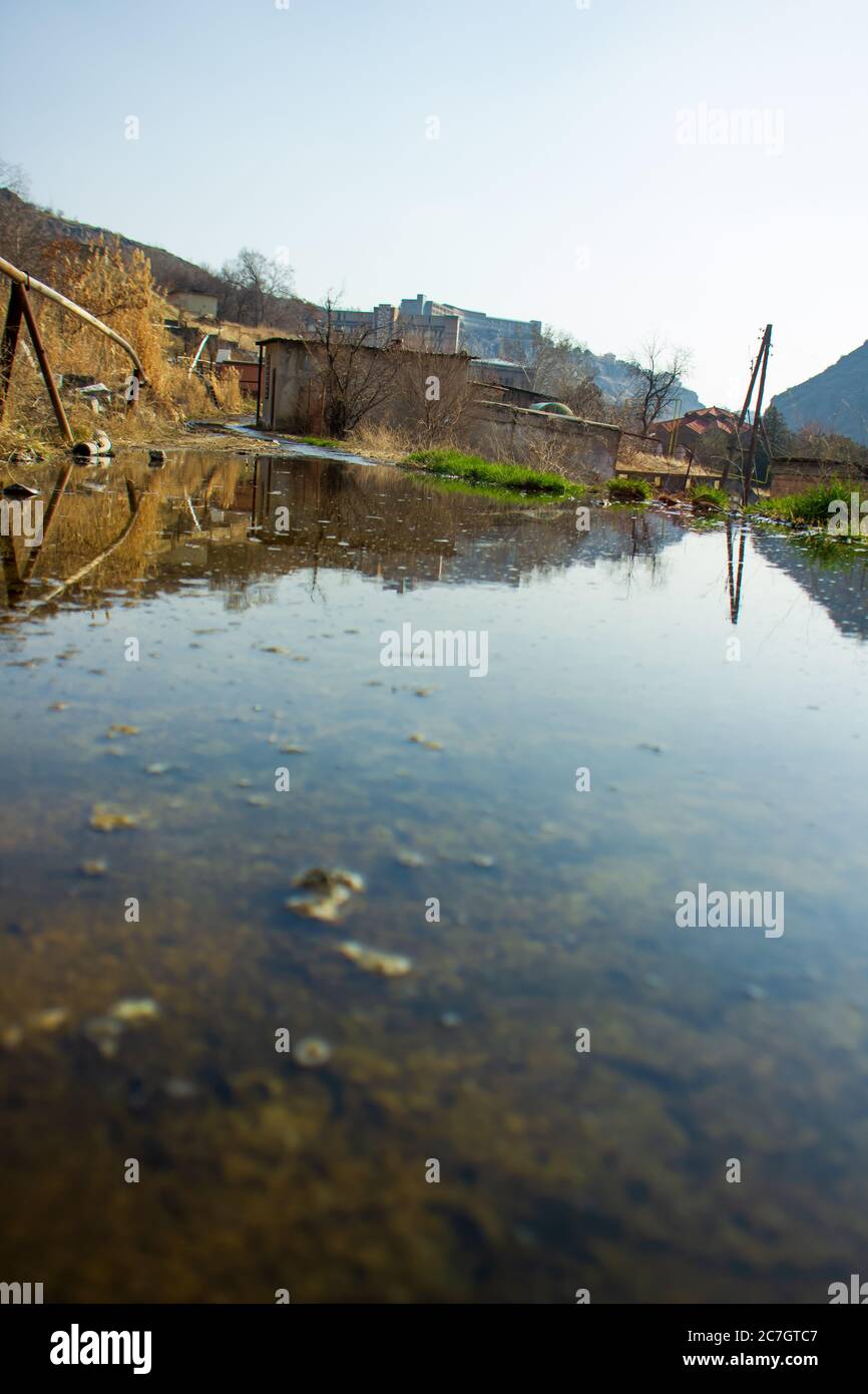 the reflection of a spring landscape on the water Stock Photo - Alamy