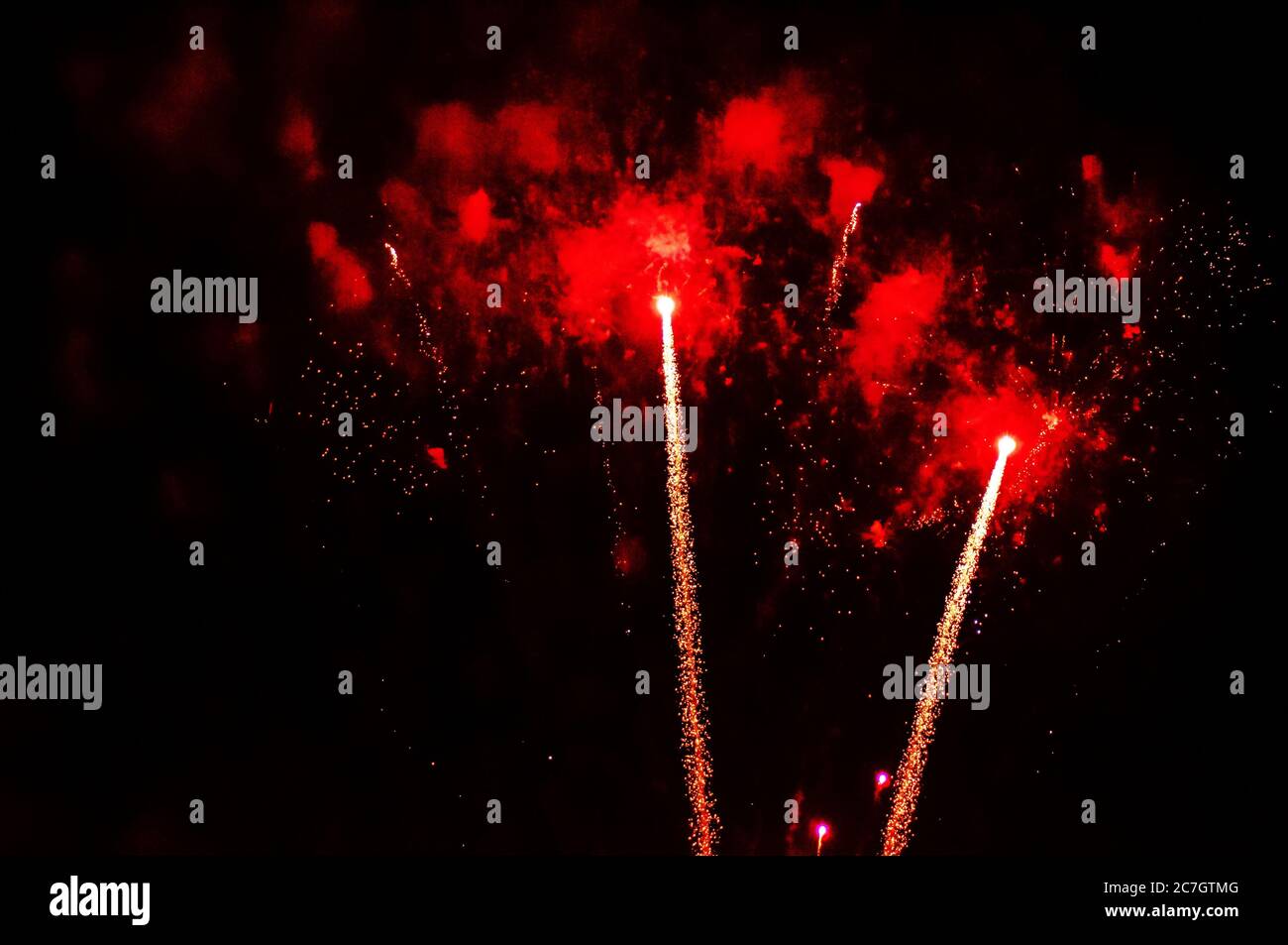 Low angle view of colorful fireworks in the sky during the night - a ...