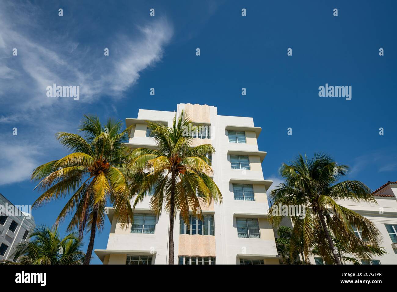 Top of building with palm tree on blue sky Miami Beach scene Stock ...