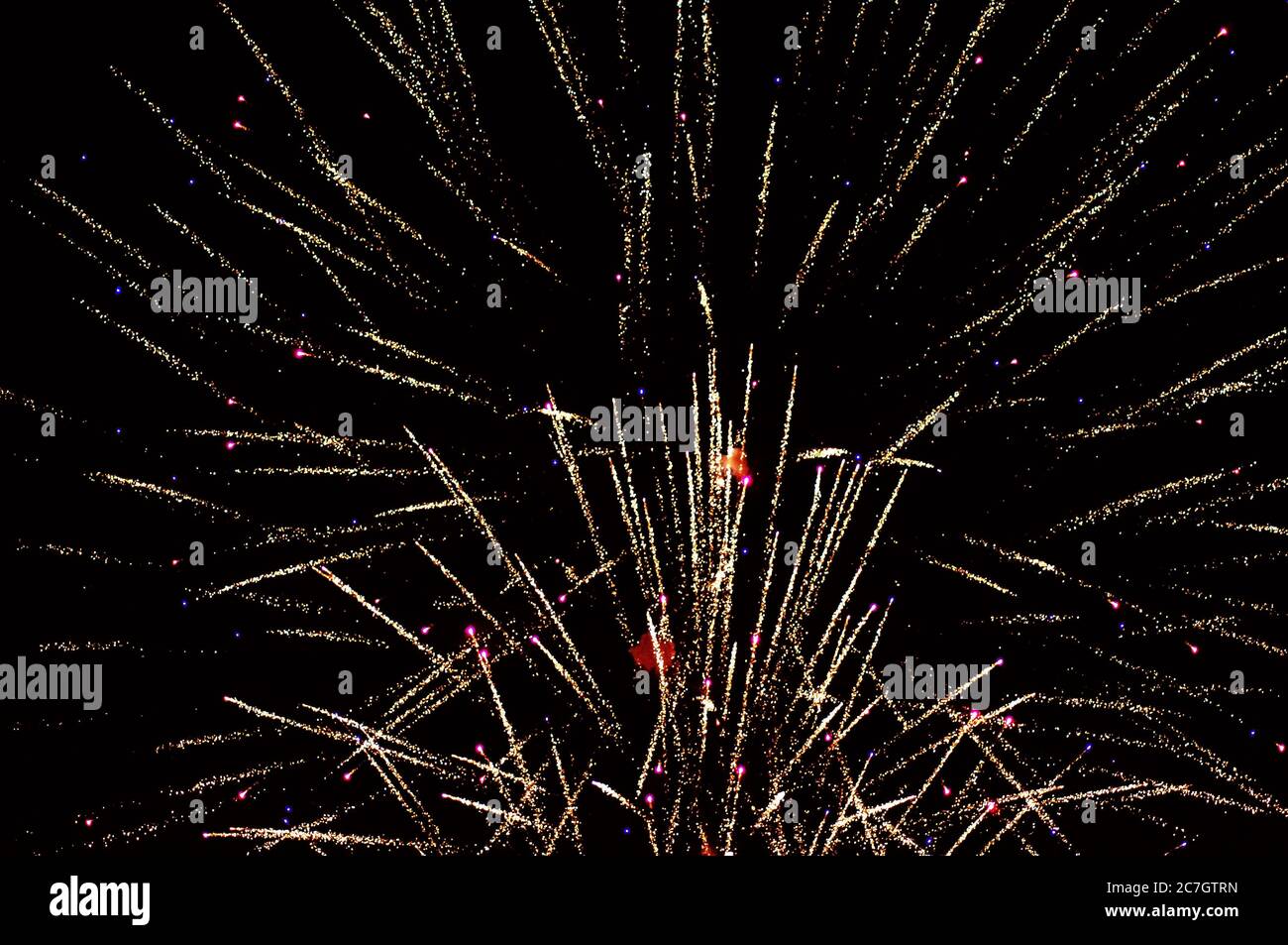 Low angle view of colorful fireworks in the sky during the night - a ...