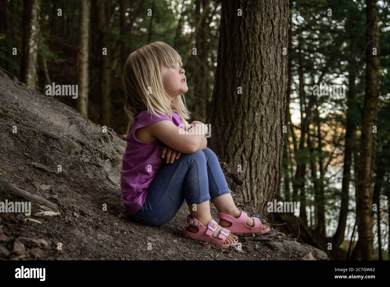 Child taking a break during hike Stock Photo - Alamy