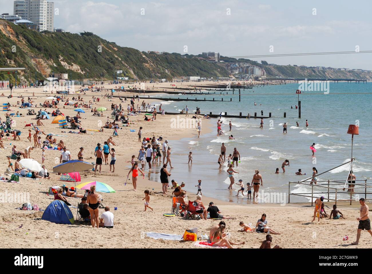 Bournemouth, UK. 17th July 2020. Hot and sunny weather draws people to ...