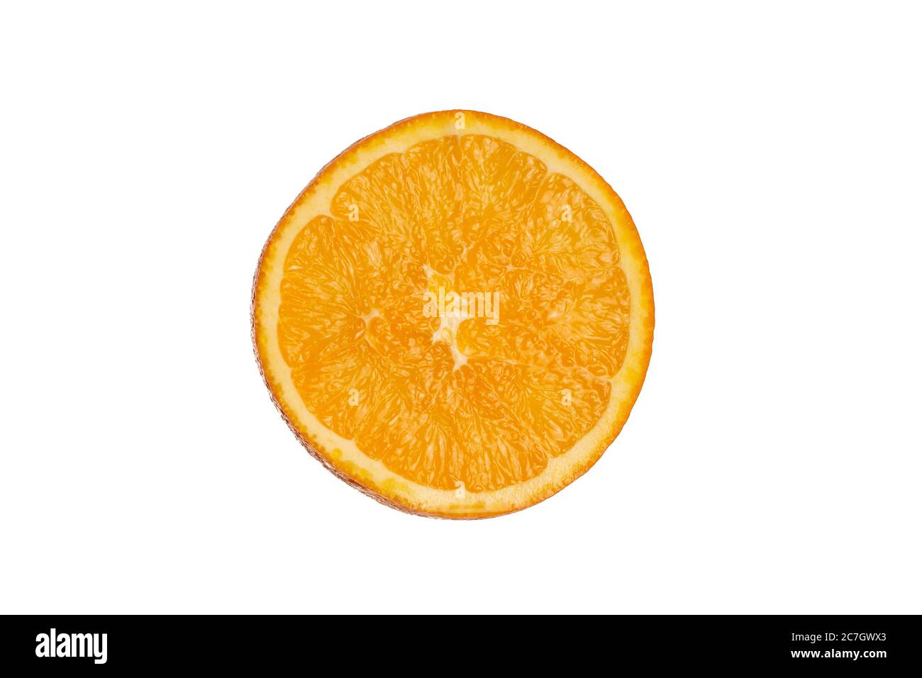 Slice of orange fruit with light shining through backlight showing the ...