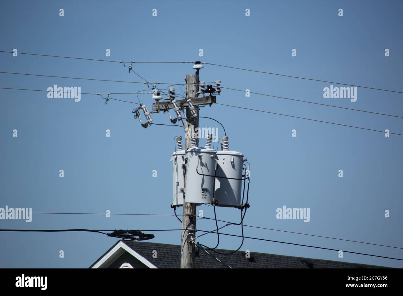 Power pole with power distribution USA detail Stock Photo - Alamy