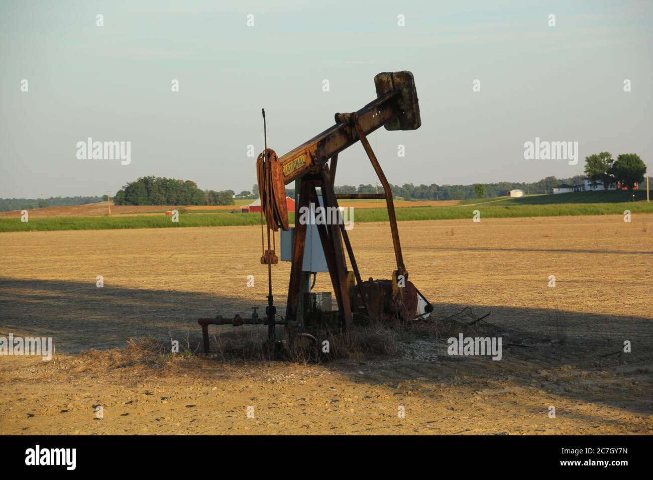 Oil drilling pump on field USA Stock Photo - Alamy
