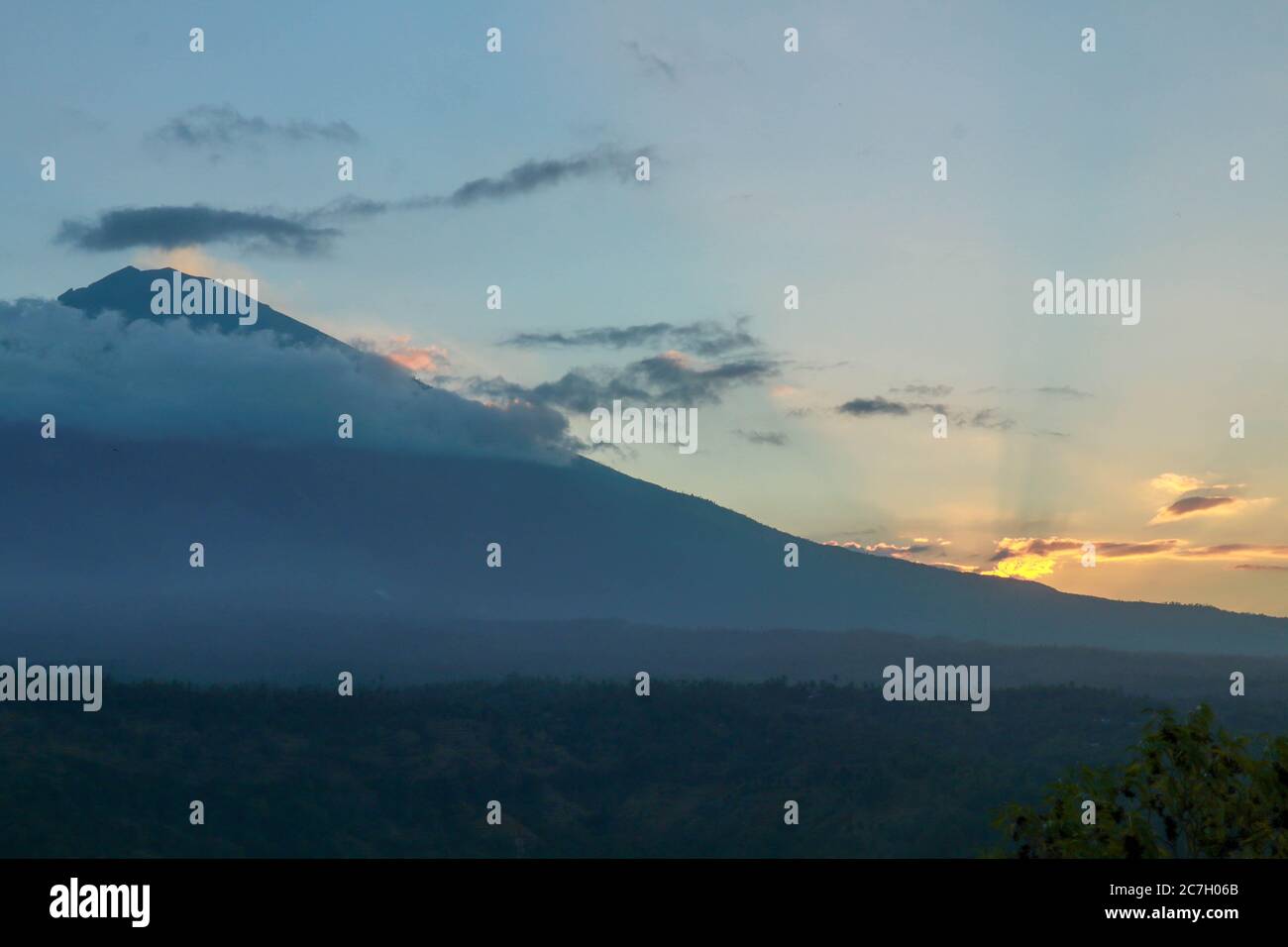 Sunset over Agung volcano seen from the boat. Stromboli is one of the ...