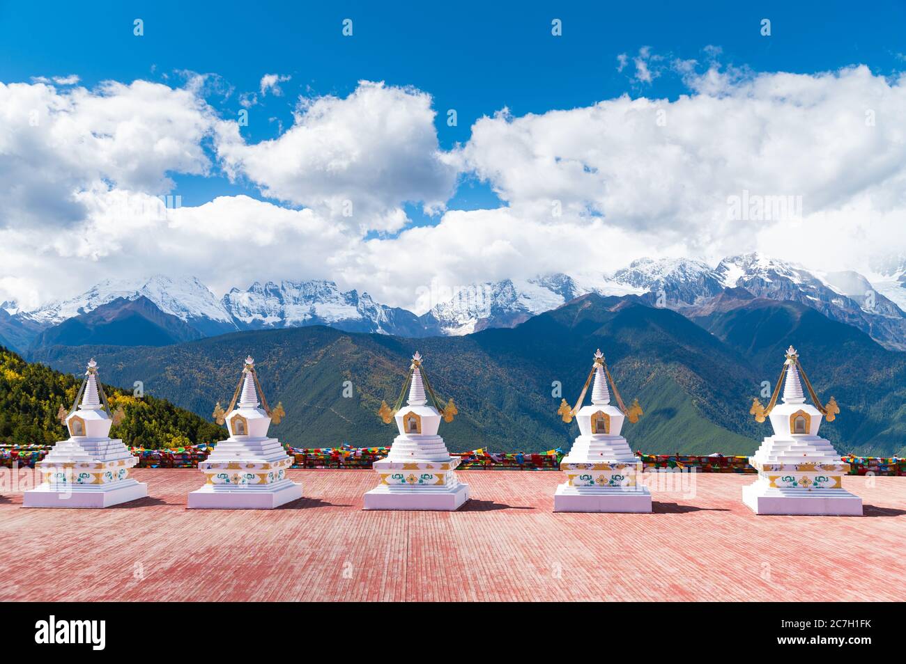 traditional Tibetan Buddhist style white pagoda with Meili snow ...