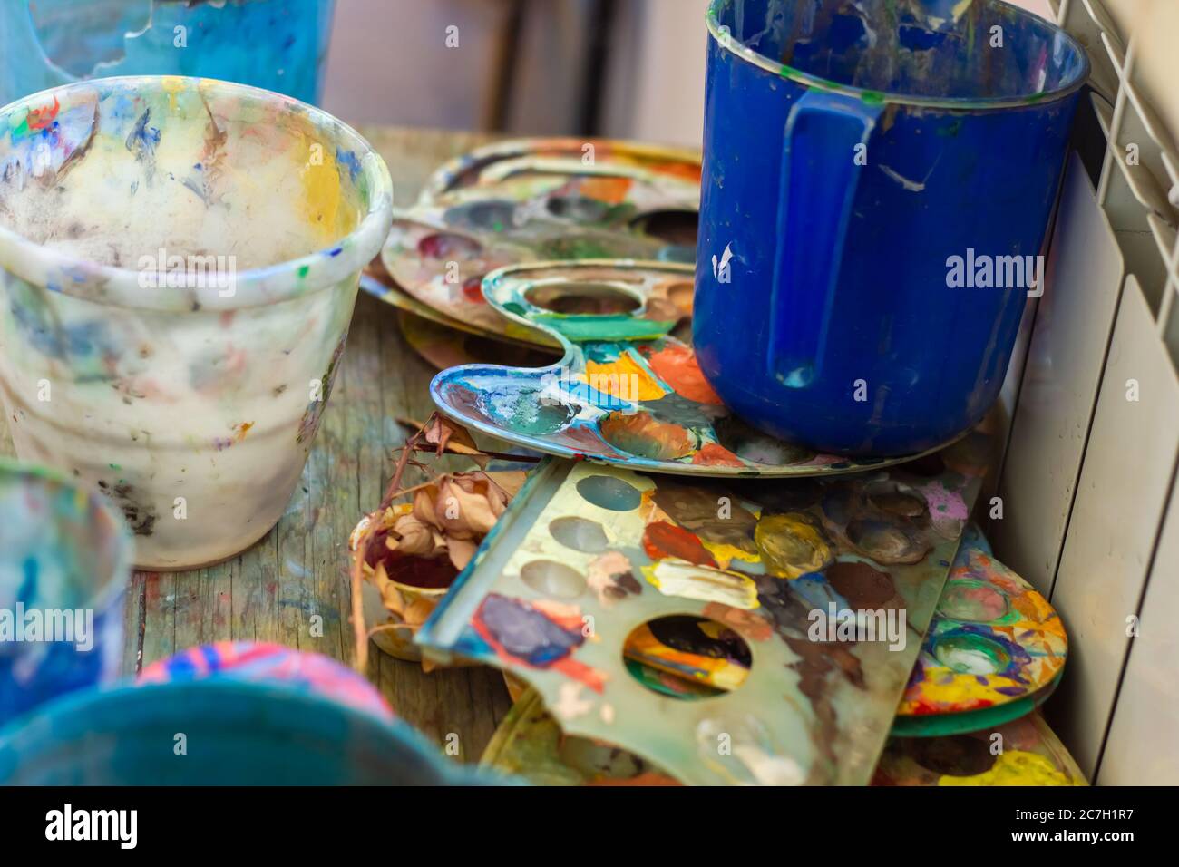 Red blue yellow green paint pots hi-res stock photography and images ...