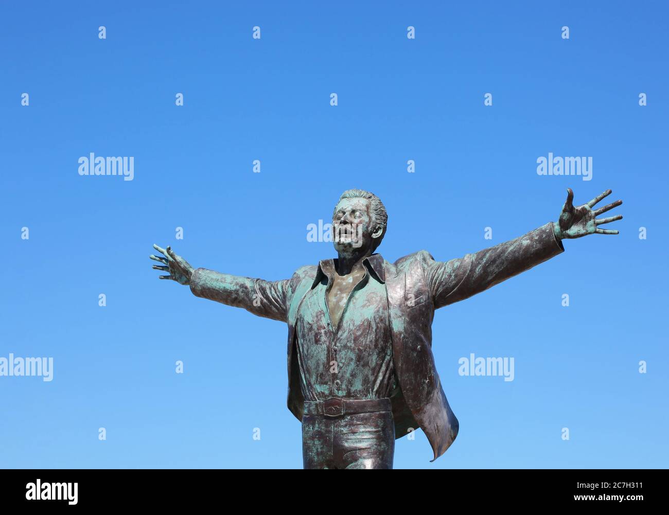 Polignano a Mare, Italy - August 15, 2014: Statue of the Italian singer ...