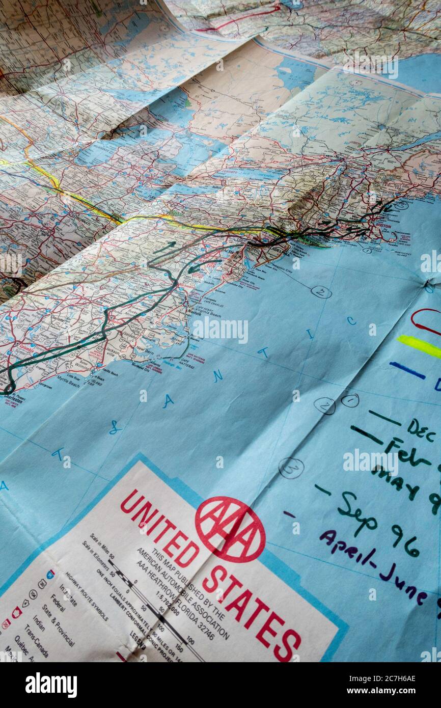 Folding United States Travel Map with Routes Marked Stock Photo - Alamy