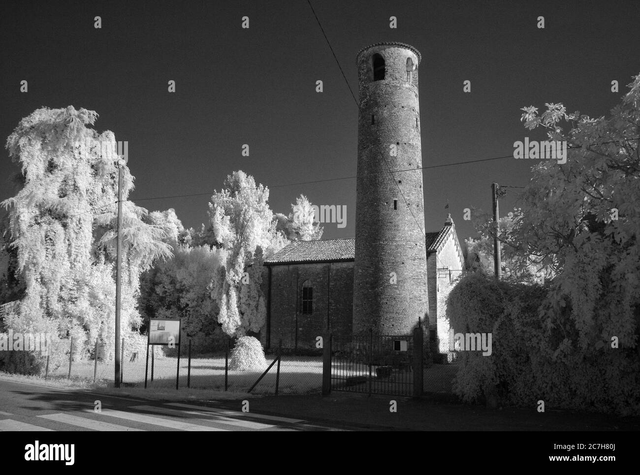 Infrared view of the ancient Romanesque tower of Tessera, Venice Stock ...
