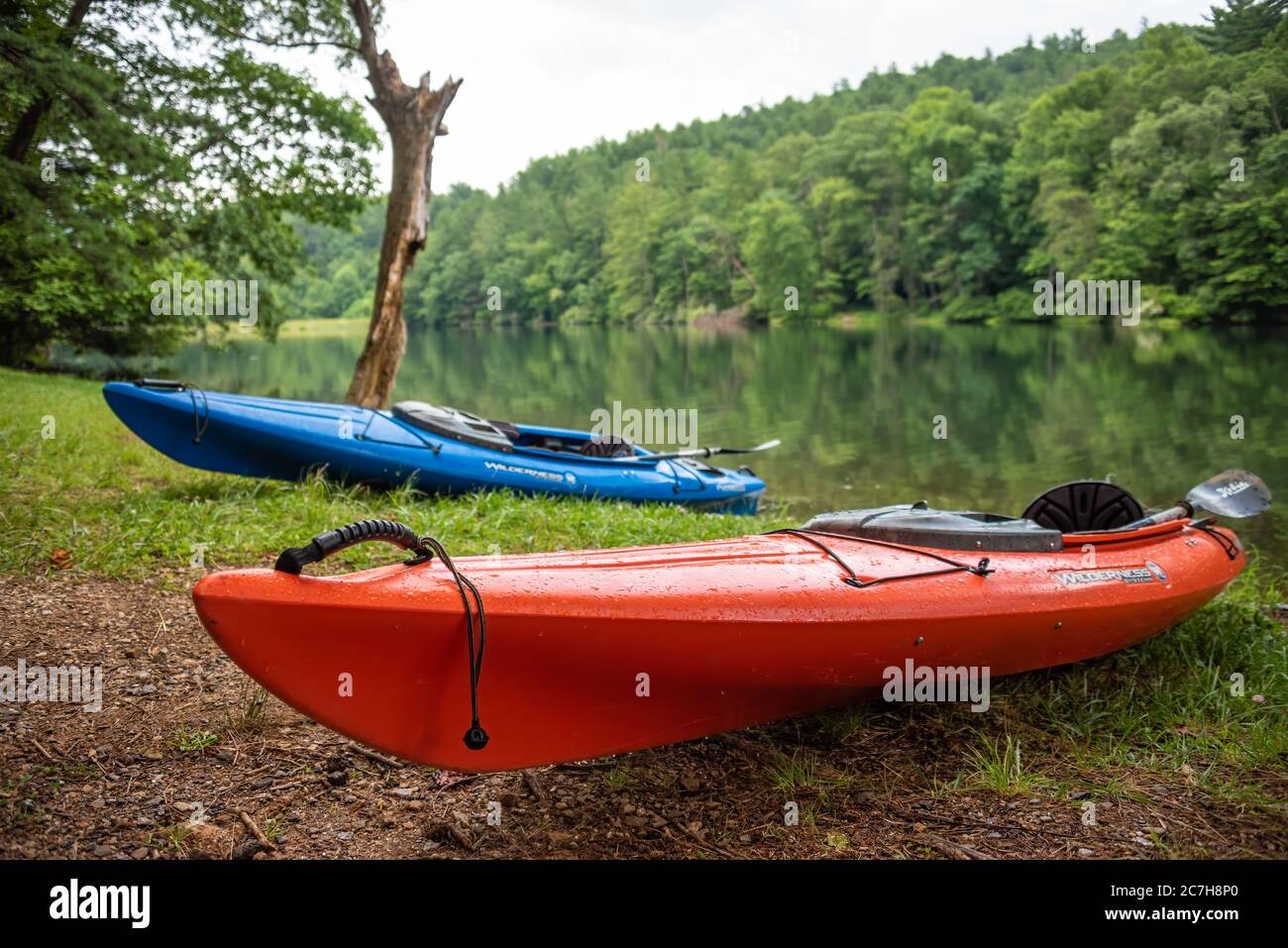 Kayaks along the shoreline of Lake Trahlyta in Vogel State Park ...