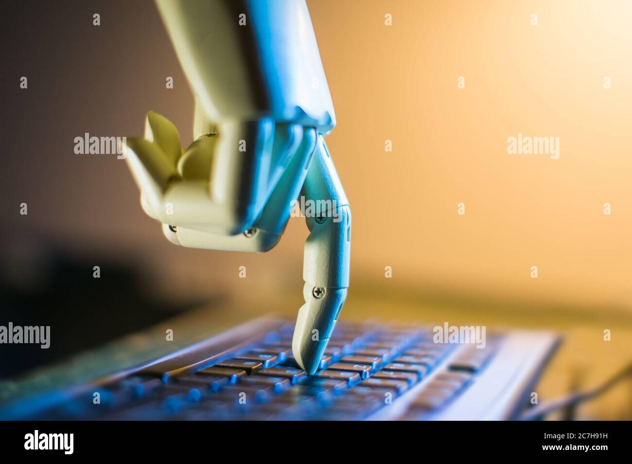 Robot typing on computer keyboard hi-res stock photography and images ...