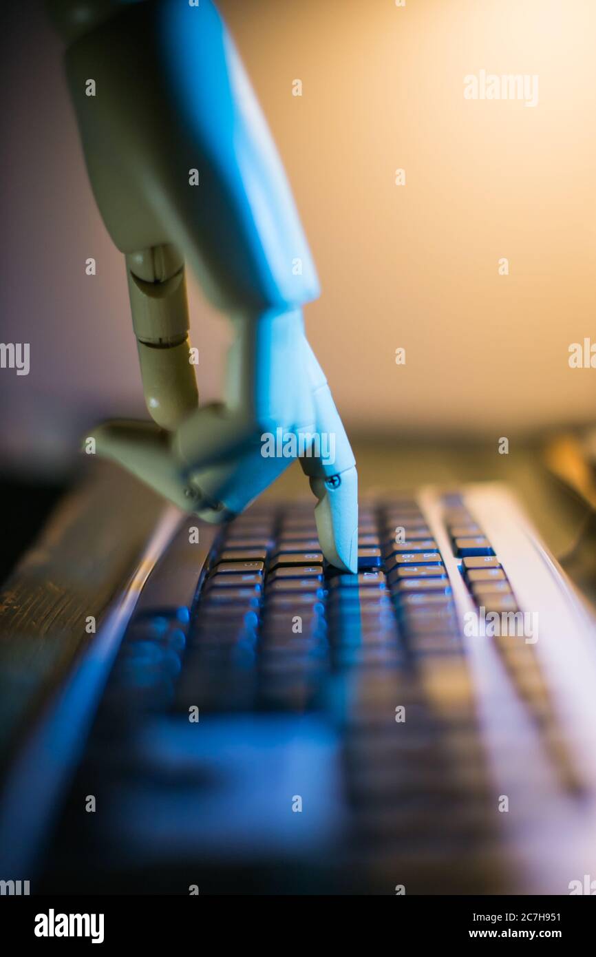 robotic hand using a computer keyboard Stock Photo - Alamy