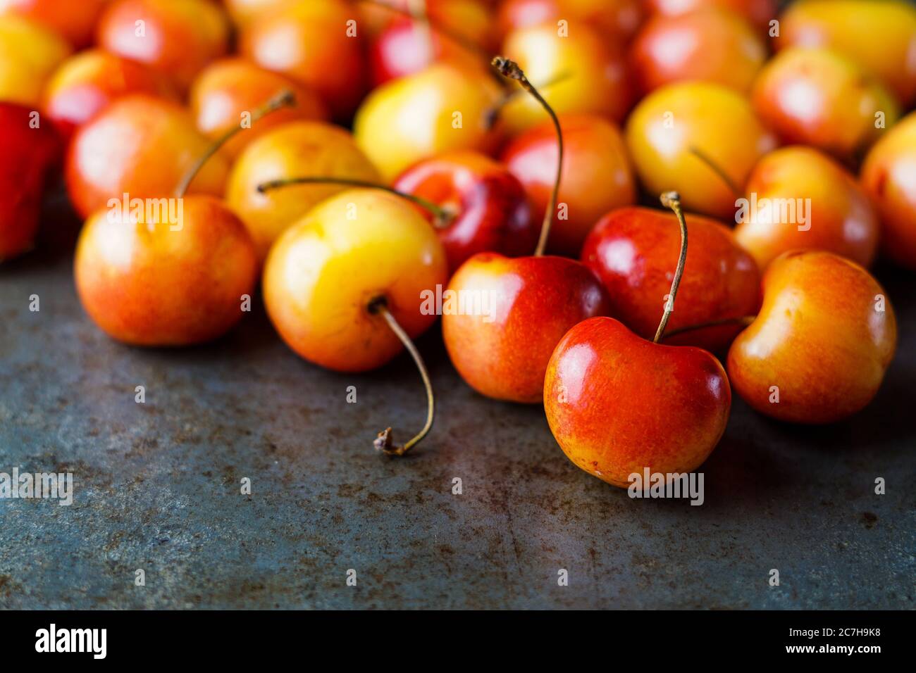 Golden yellow rainier cherries hi-res stock photography and images - Alamy