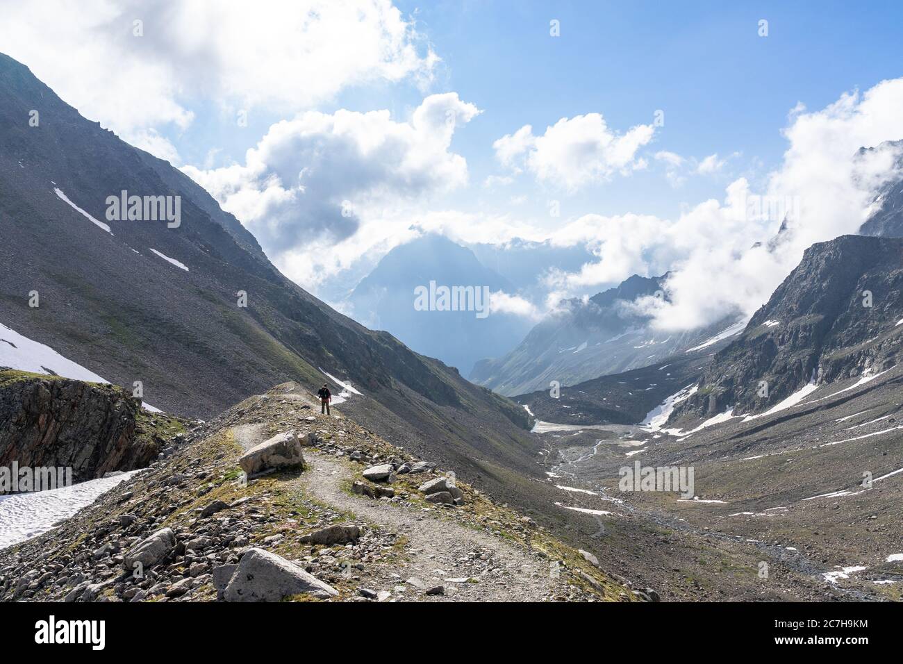 Mountaineer climbing mountain side view hi-res stock photography and ...