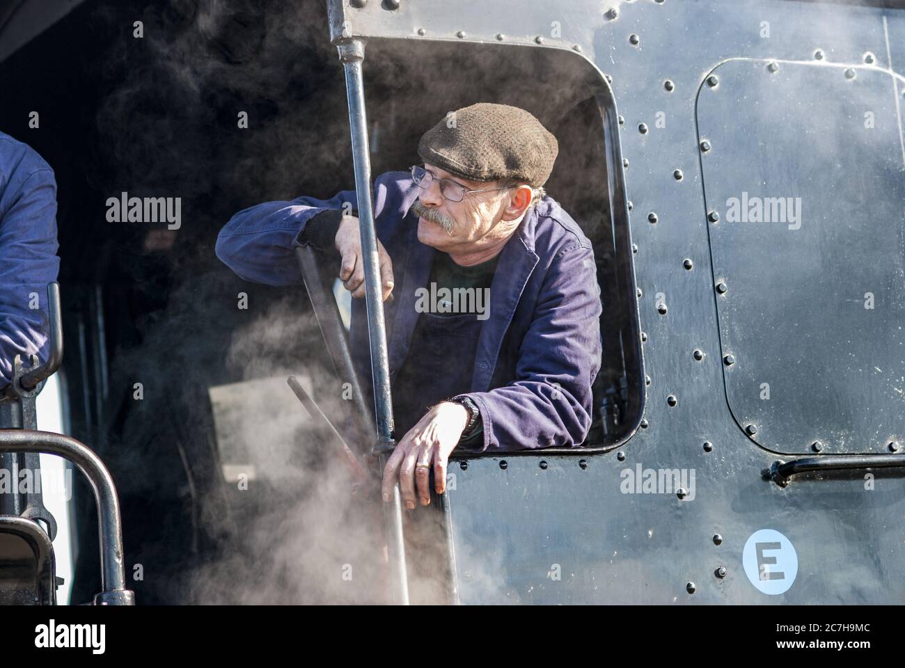DIDCOT, UNITED KINGDOM - Feb 17, 2008: Engine driver of a steam train ...