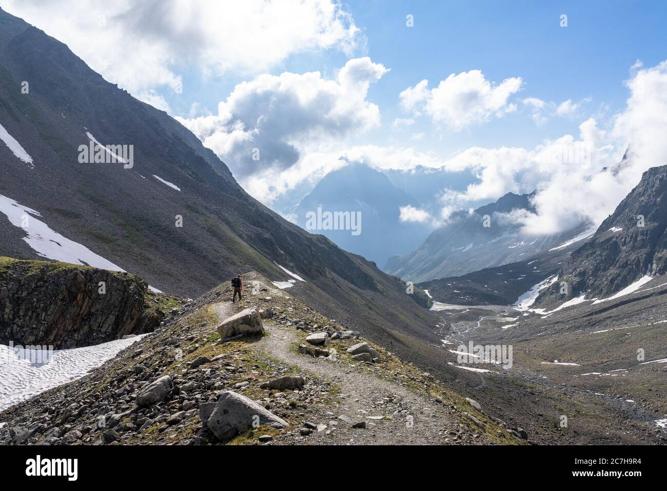 Mountaineer climbing mountain side view hi-res stock photography and ...
