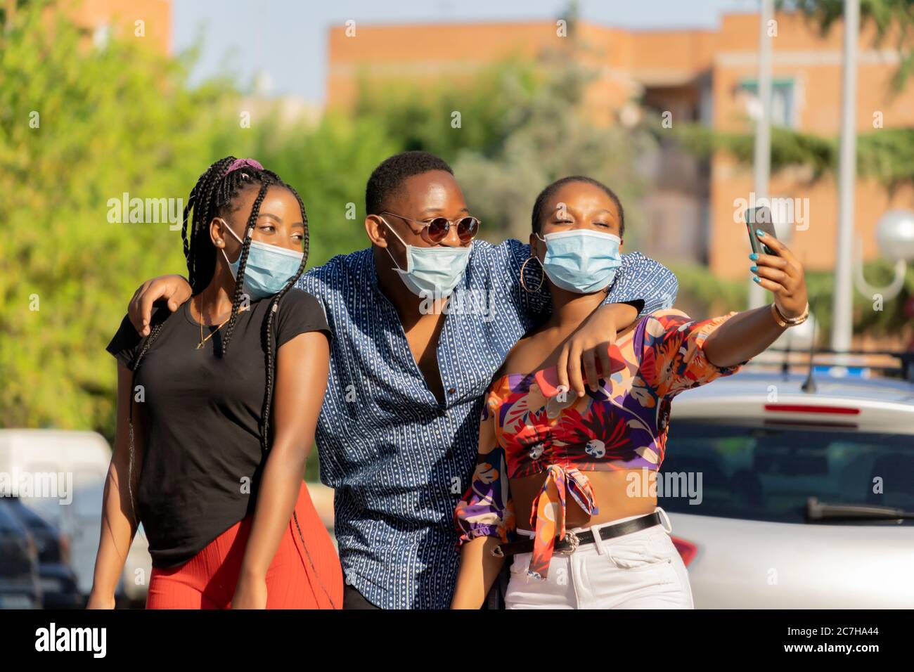 group of africans with their smartphones around the city Stock Photo ...