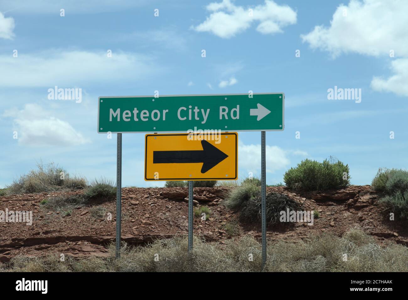 Road sign for Meteor City Road against blue sky, historic Route 66 ...