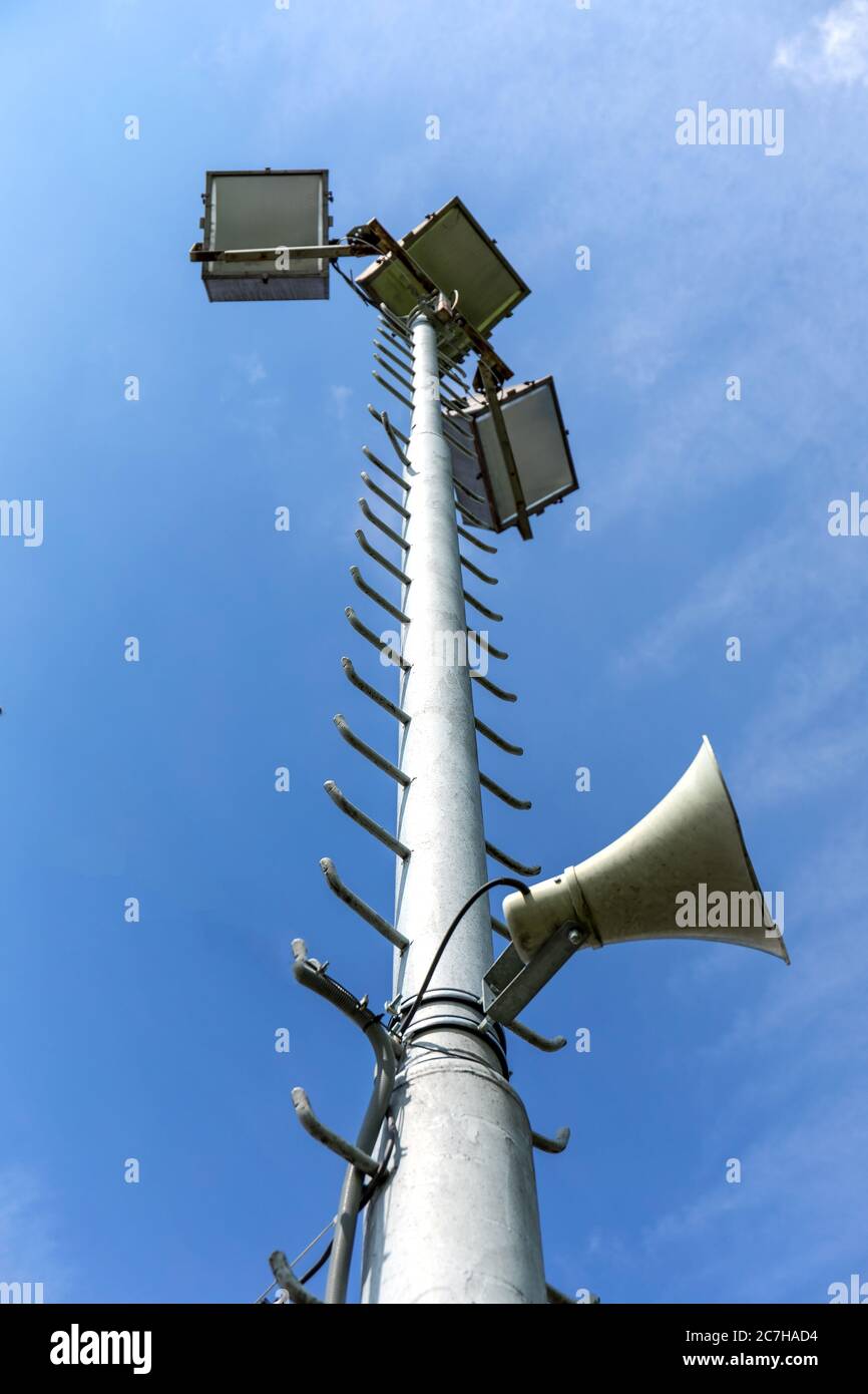Reflector light for playground on blue sky background. Halogen light on ...