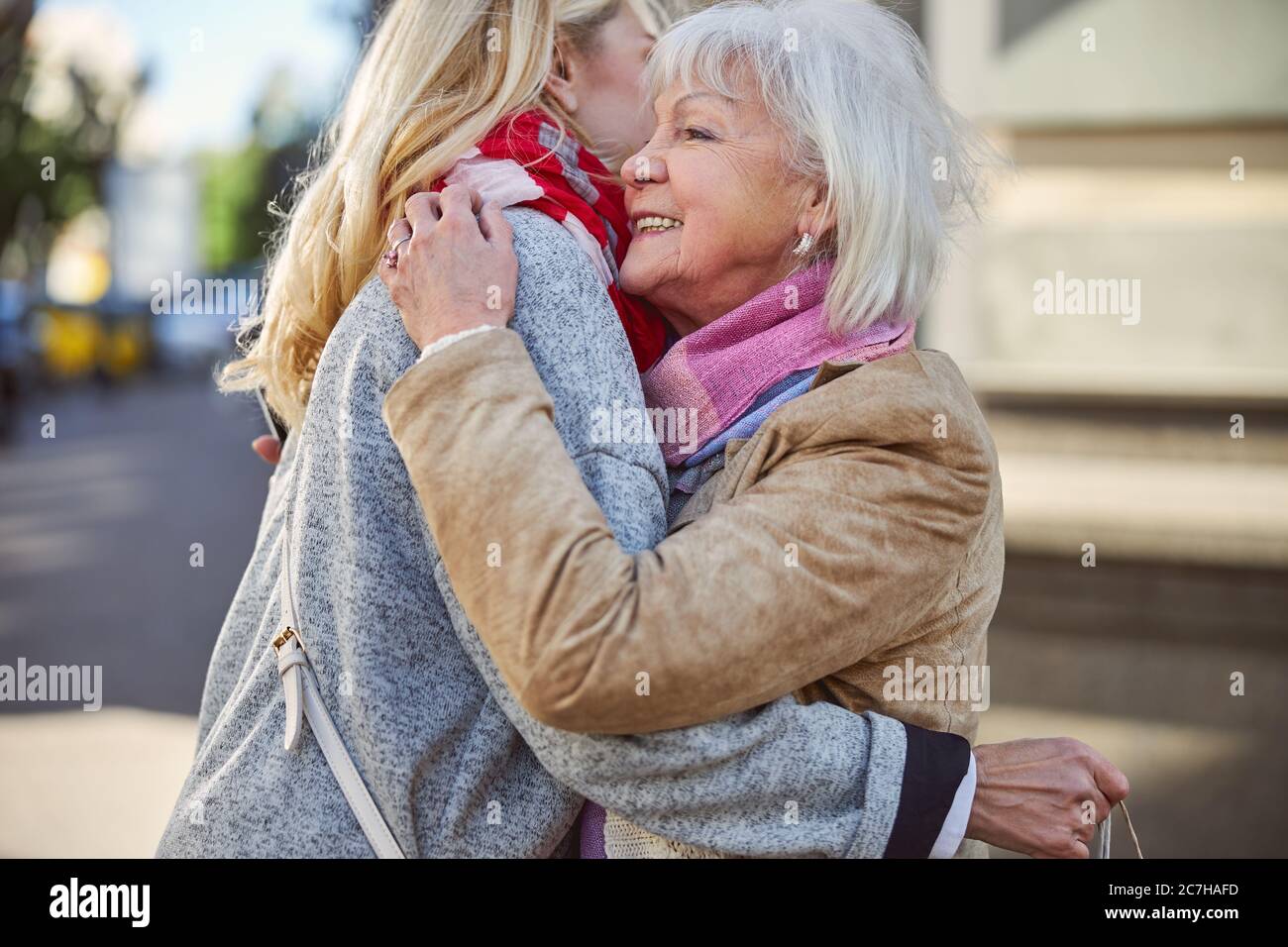Two beautiful happy women having good time together Stock Photo - Alamy