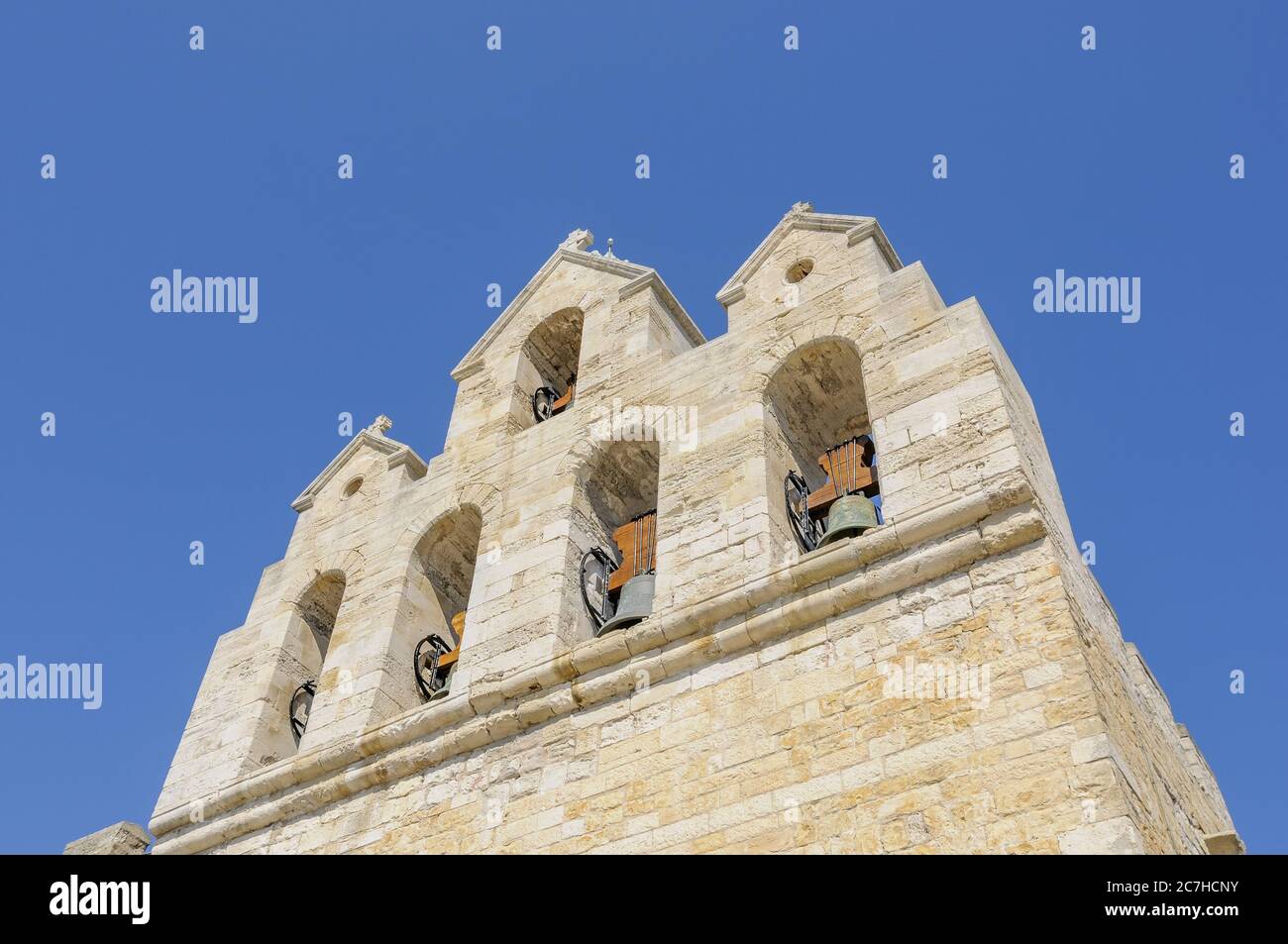 Low angle shot of the bell of of the L'eglise Notre Dame de la Mer captured in France Stock ...