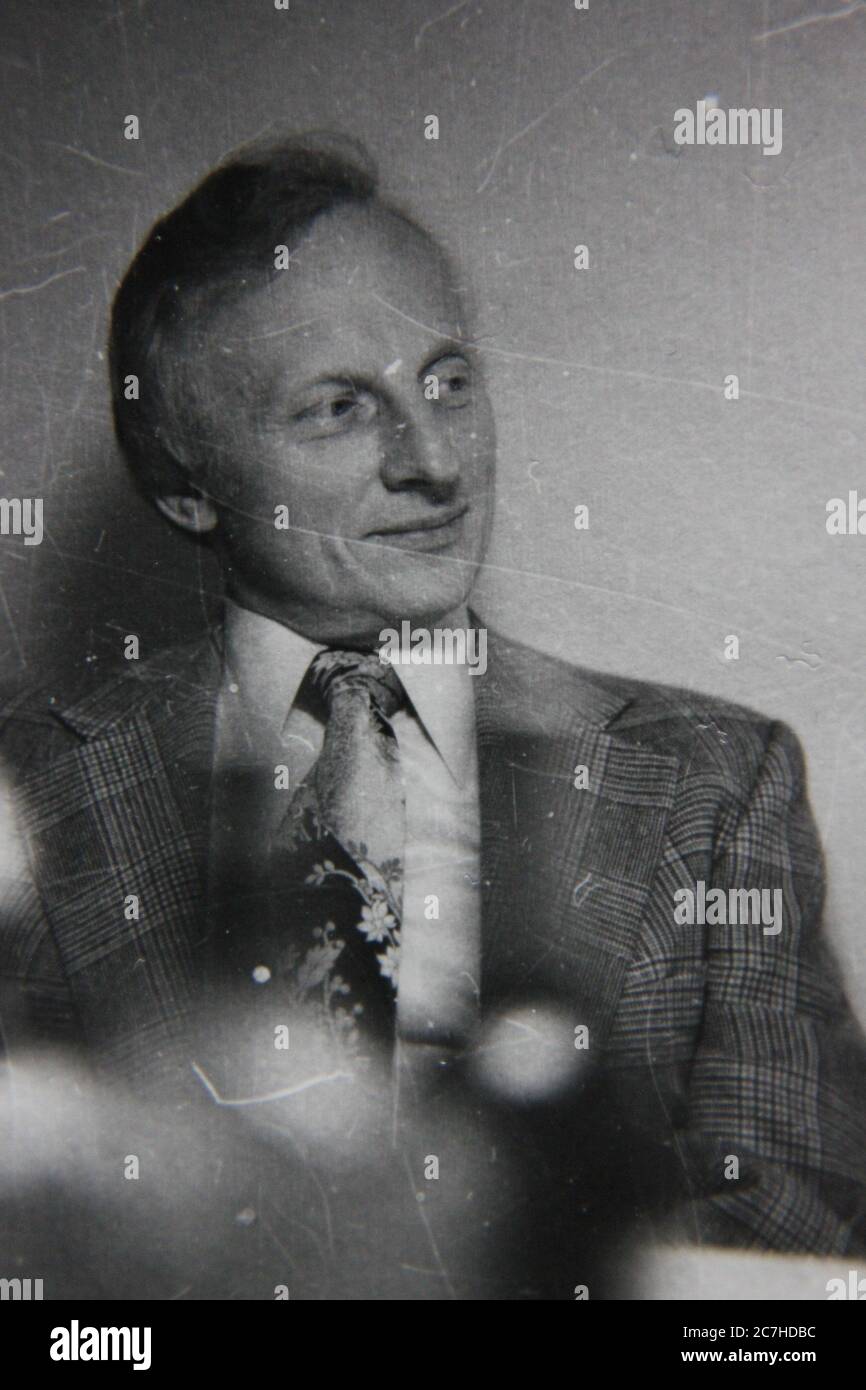 Fine 70s vintage black and white lifestyle photography of a middle aged ...