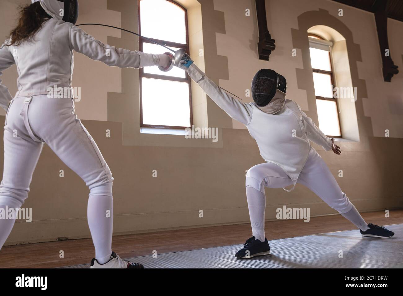 Fencing female fencer lunging hi-res stock photography and images - Alamy