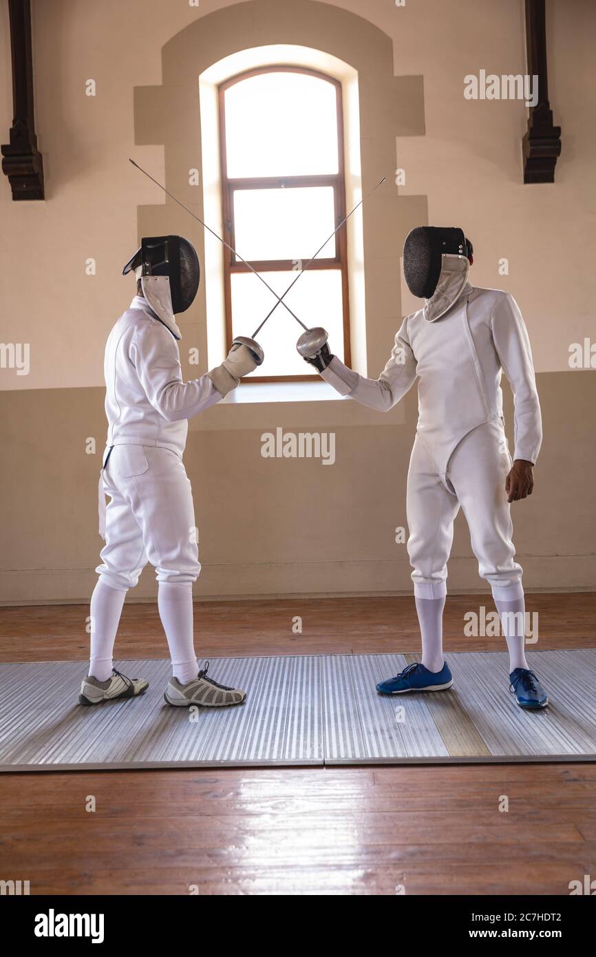 Two male fencers practicing fencing Stock Photo - Alamy