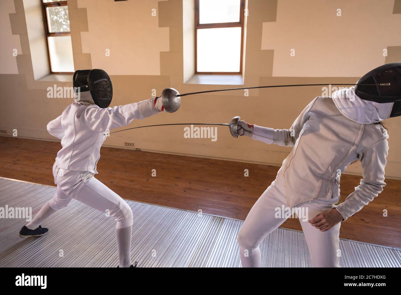 Two male fencers practicing fencing Stock Photo - Alamy