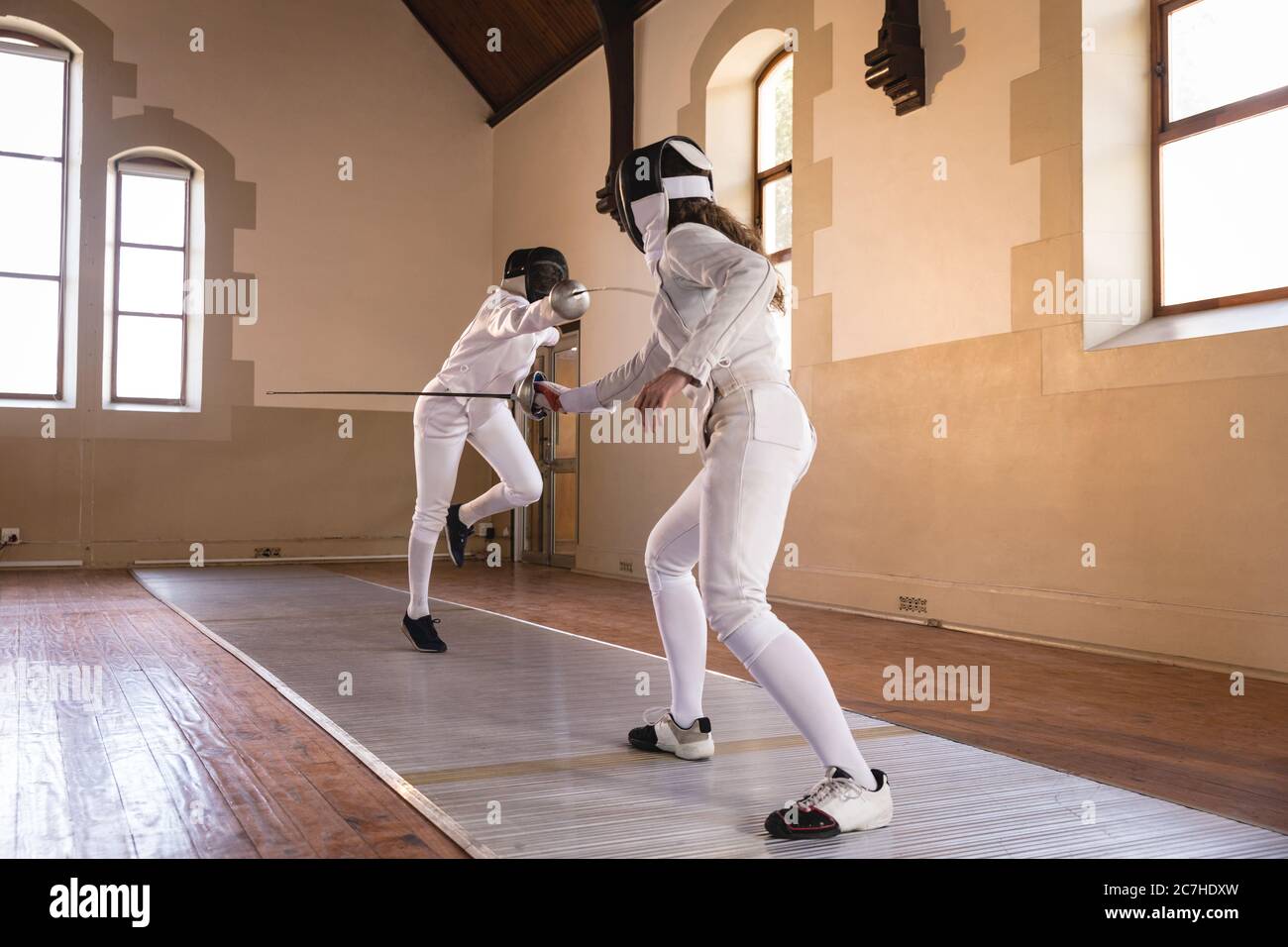 Two young fencers fighting hi-res stock photography and images - Alamy